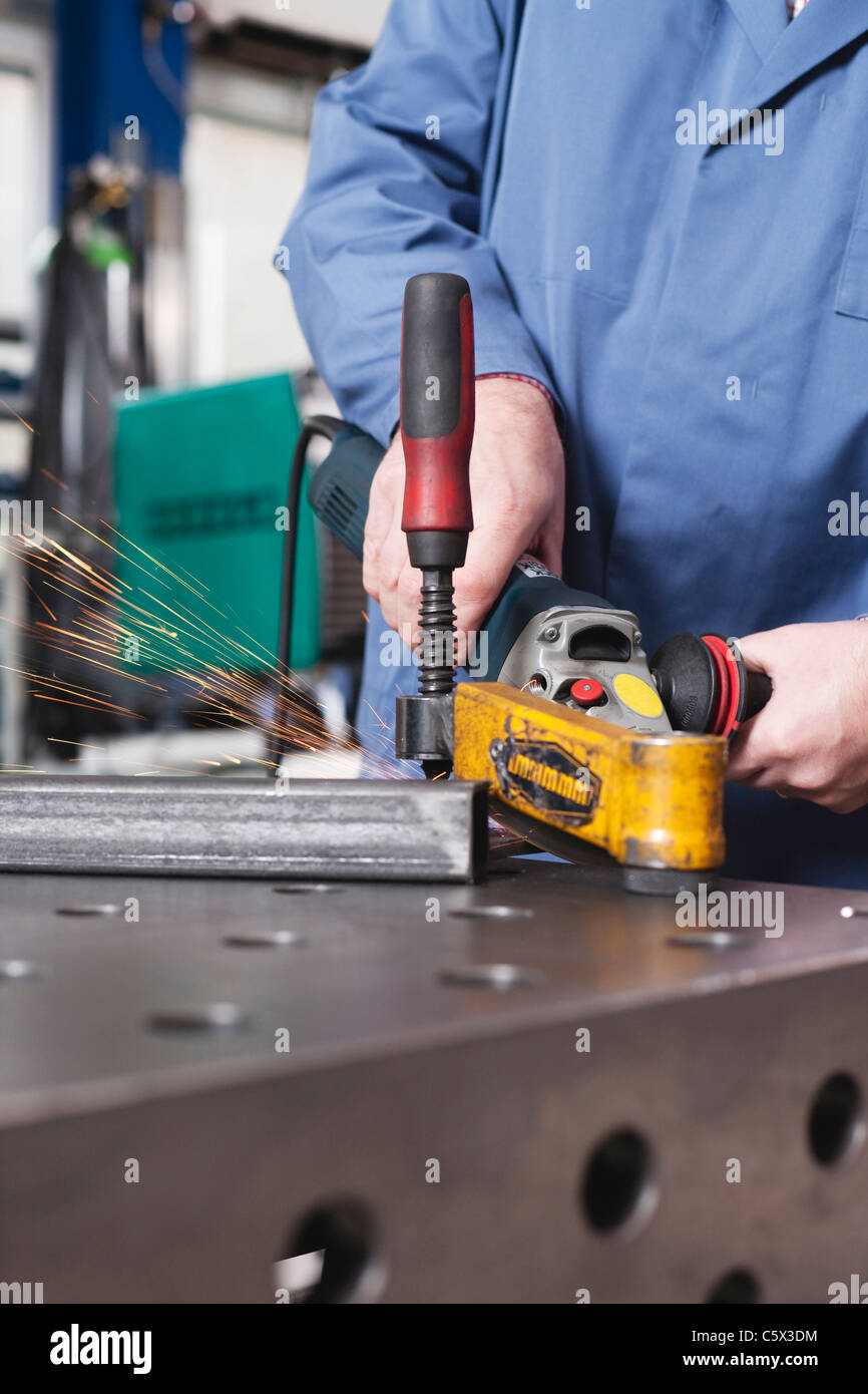 Germany, Neukirch, Person using grinder Stock Photo - Alamy