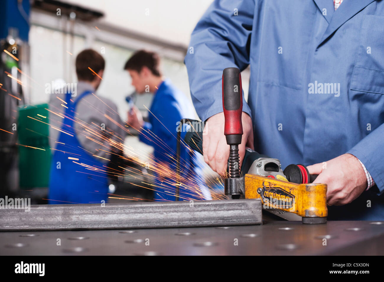 Germany neukirch apprentice foreman using hi-res stock photography and ...