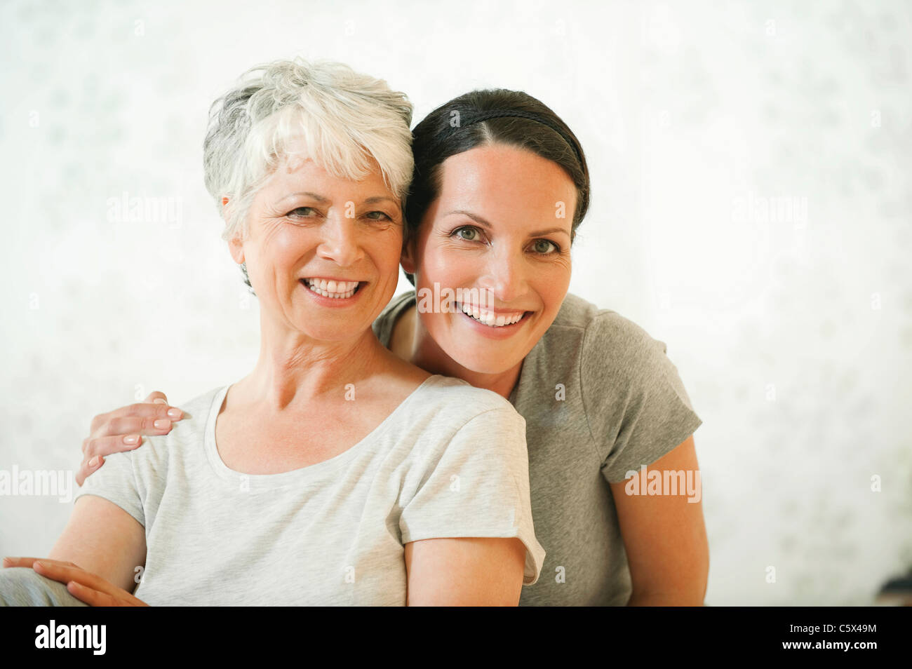 Two women smiling, portrait Stock Photo - Alamy
