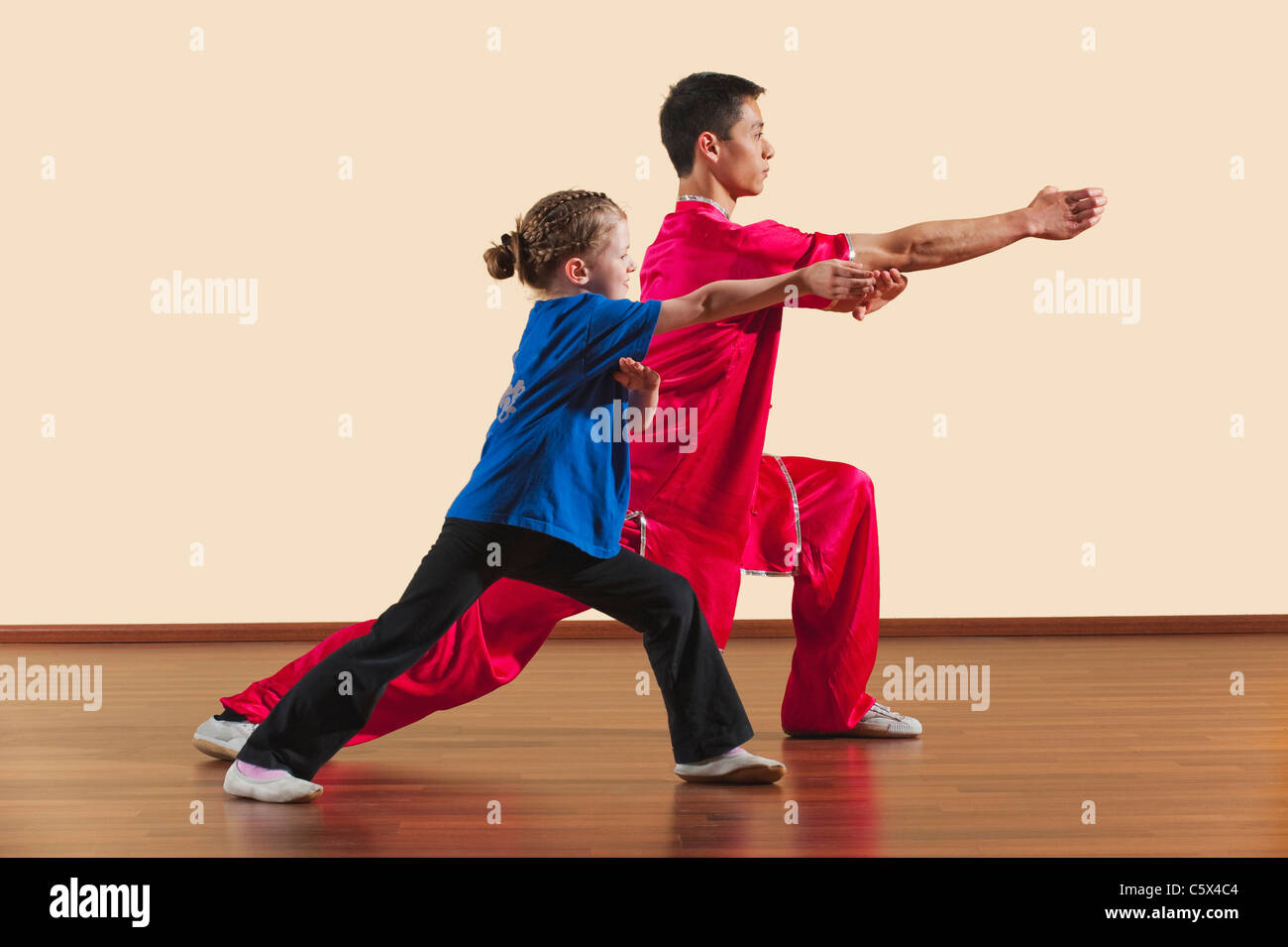 Kung Fu, Changquan, Gongbu qia hou, Long Fist Style, Kung Fu instructor and girl (6-7 Stock ...