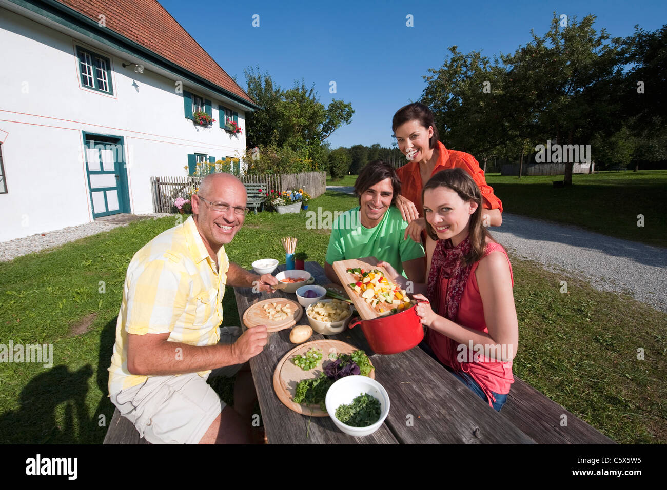 Three people table house germany hi-res stock photography and images ...