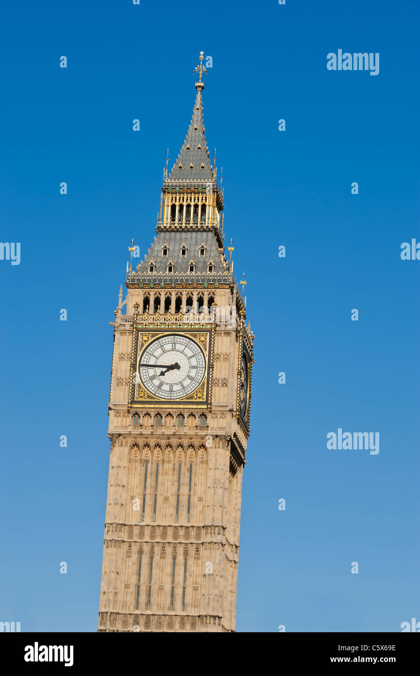 The clock tower of the Palace of Westminster that houses the bell known ...