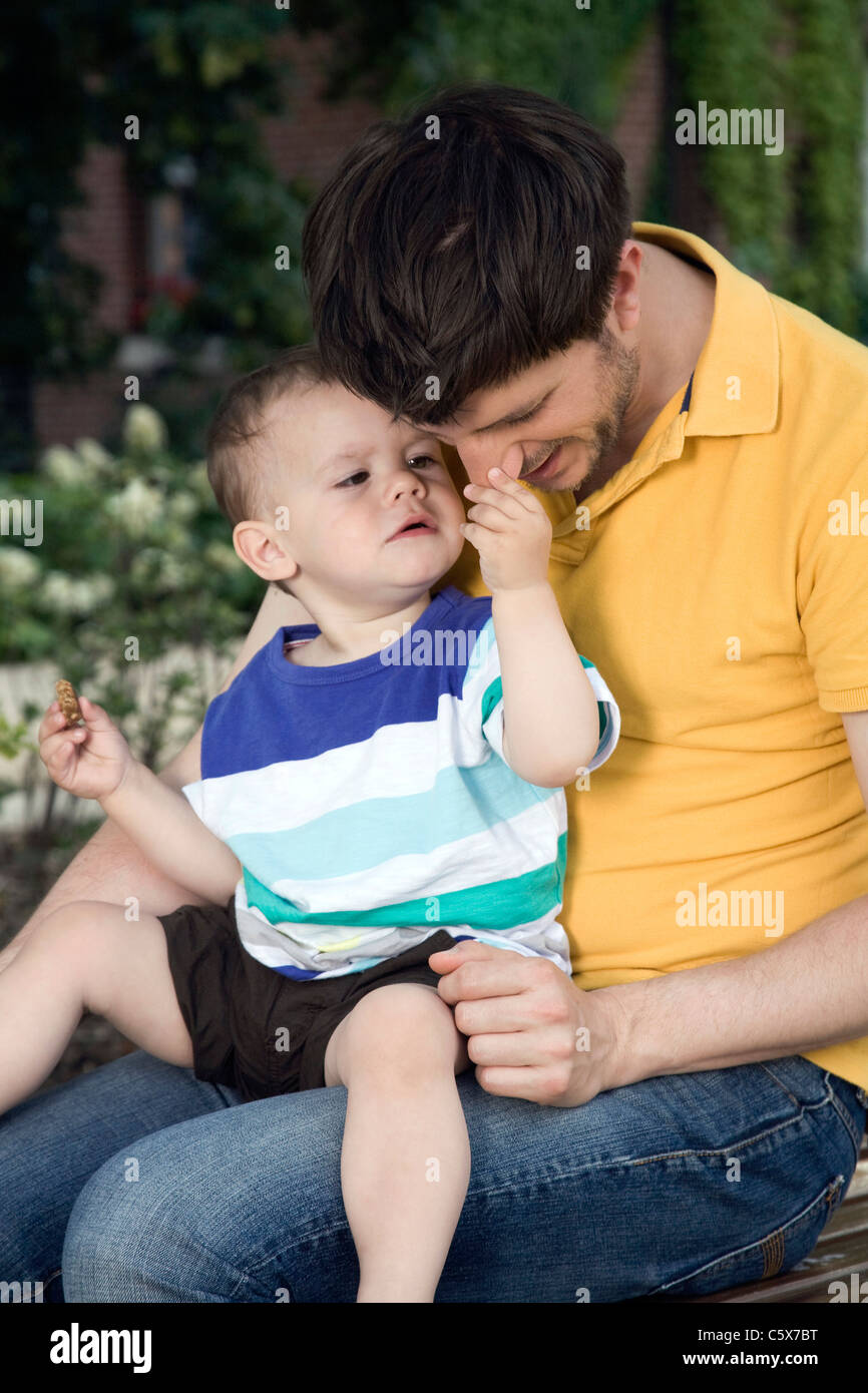 Germany, Berlin, Father and son (2-3), son touching father's nose Stock ...