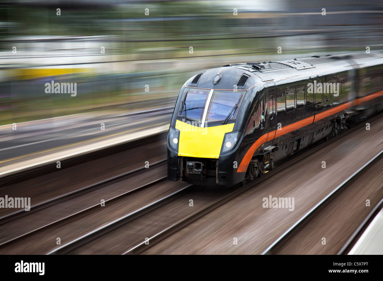 Fast moving modern train Stock Photo - Alamy