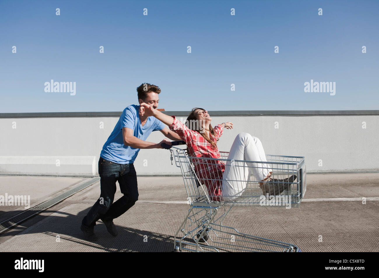 Woman pushing man away park hi-res stock photography and images - Alamy