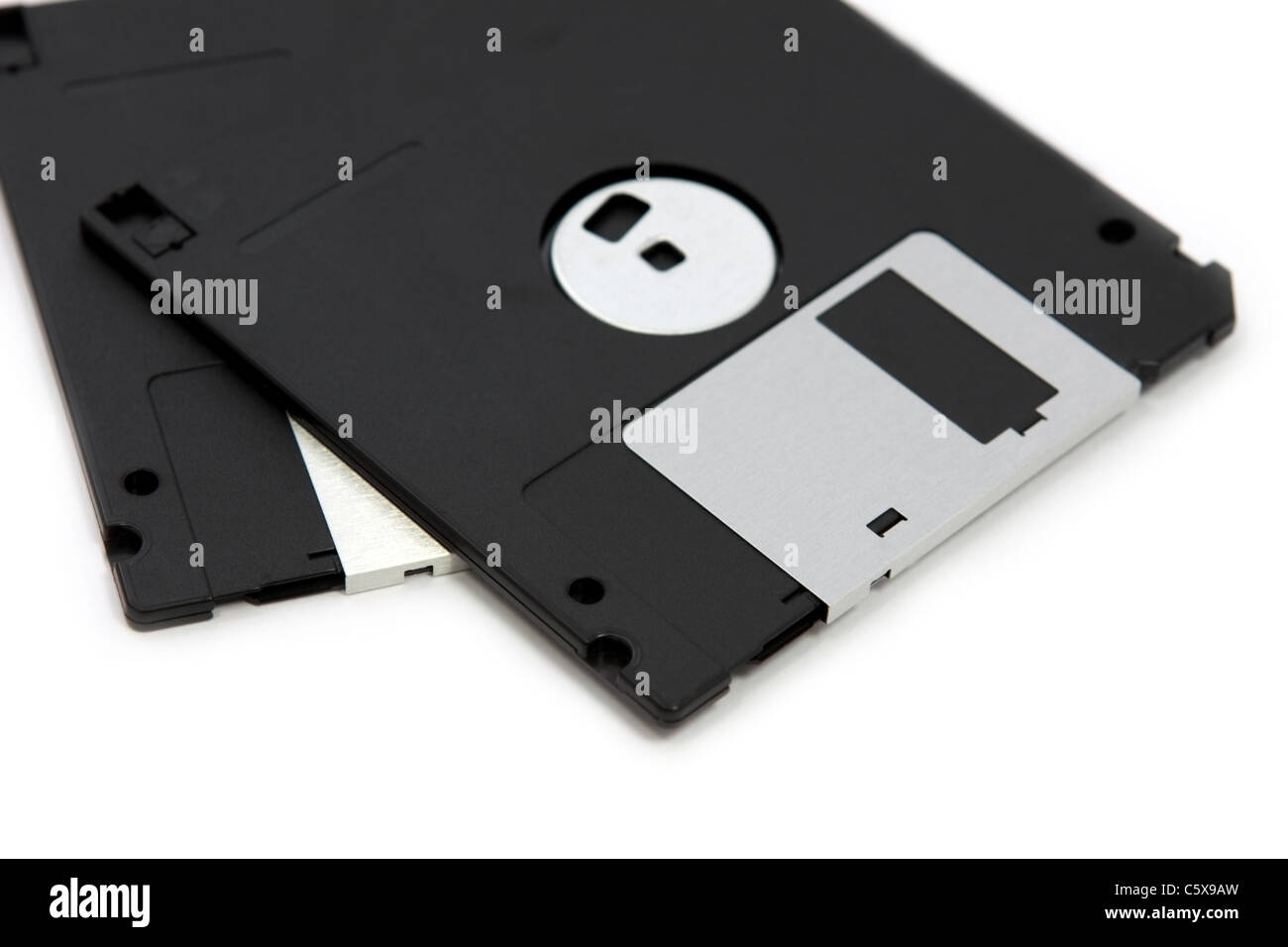 old floppy discs close up isolated on white background Stock Photo - Alamy
