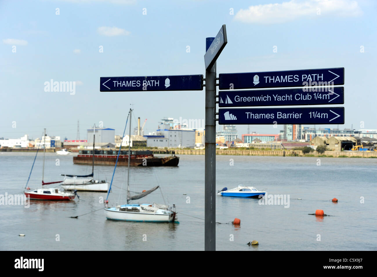 Direction signs on Greenwich Peninsula along Thames-side Path Stock ...