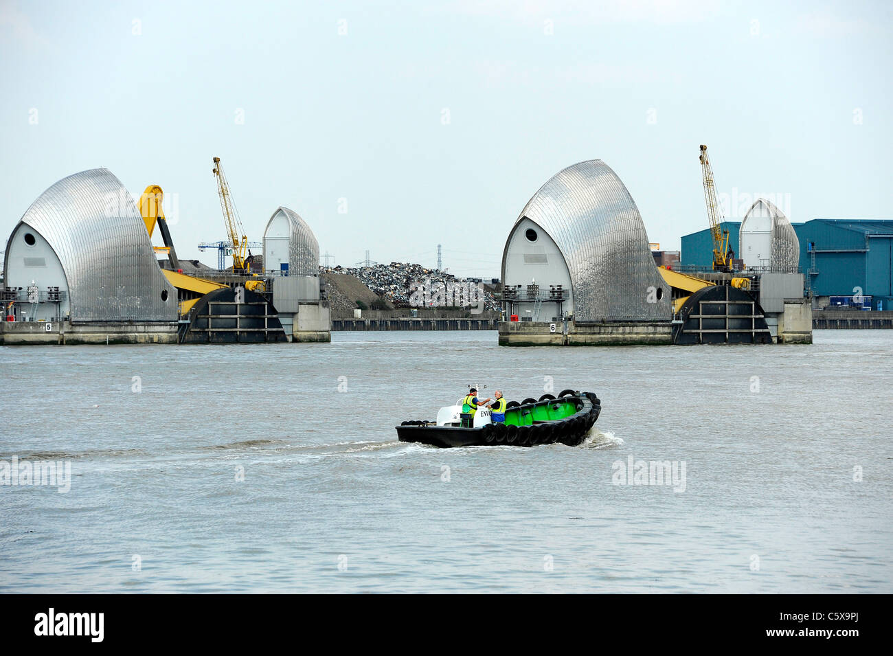Happy dad carries serious podgy cute son Stock Photo - Alamy