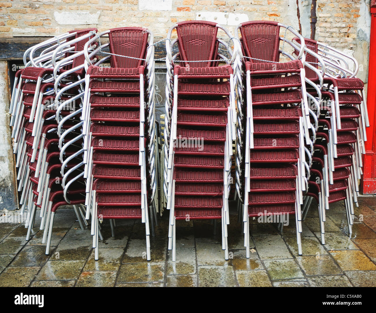 Stack of chairs Stock Photo - Alamy