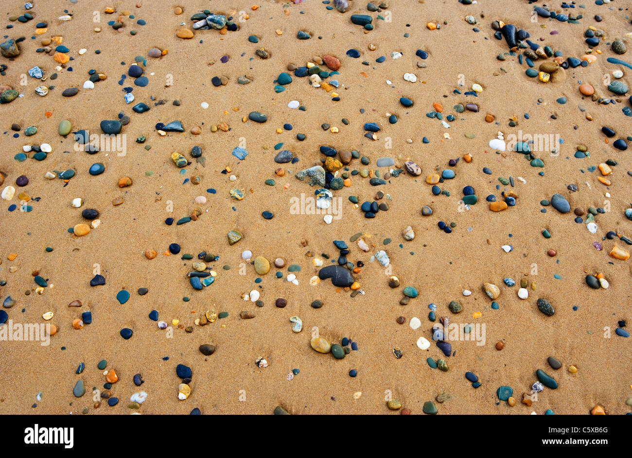 Pebbles On Beach Coloured Pebbles High Resolution Stock Photography and ...