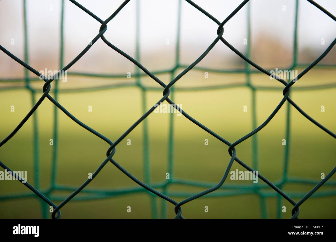 Mesh fence sports field hi-res stock photography and images - Alamy