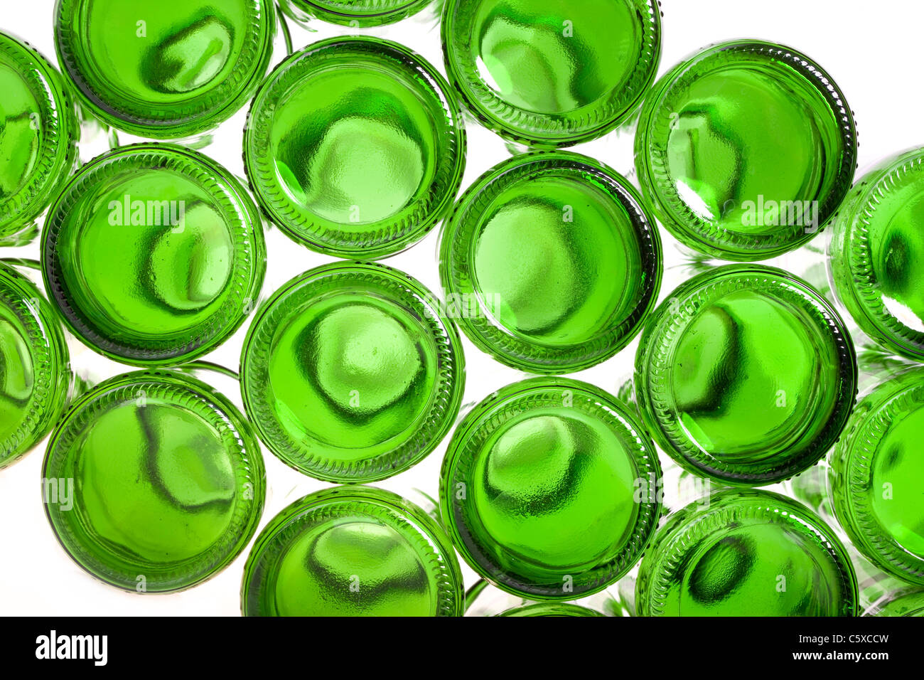 Bottoms of empty glass bottles on white background Stock Photo - Alamy