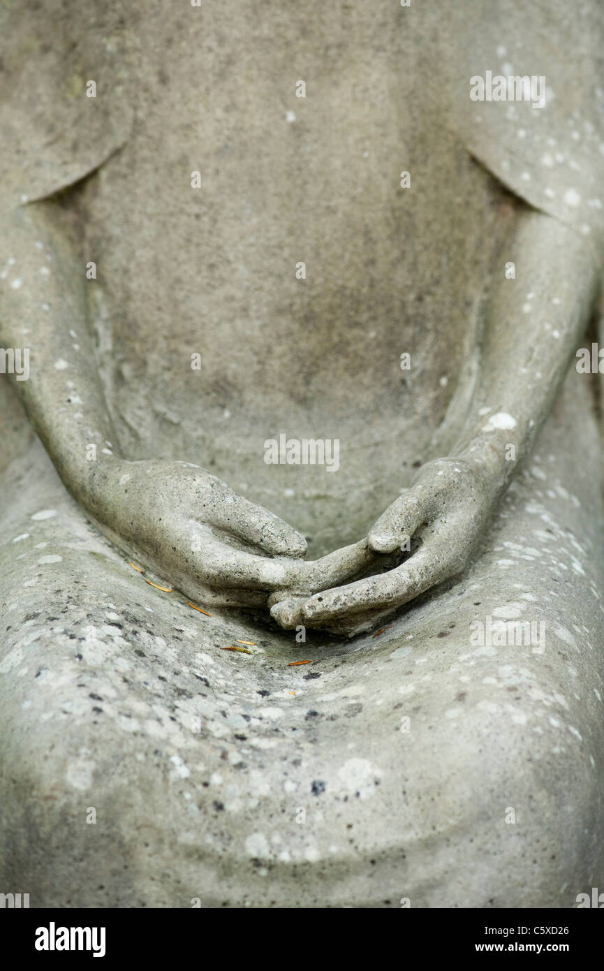 Stone hands on a lap. Garden sculpture / statue abstract at Waterperry ...