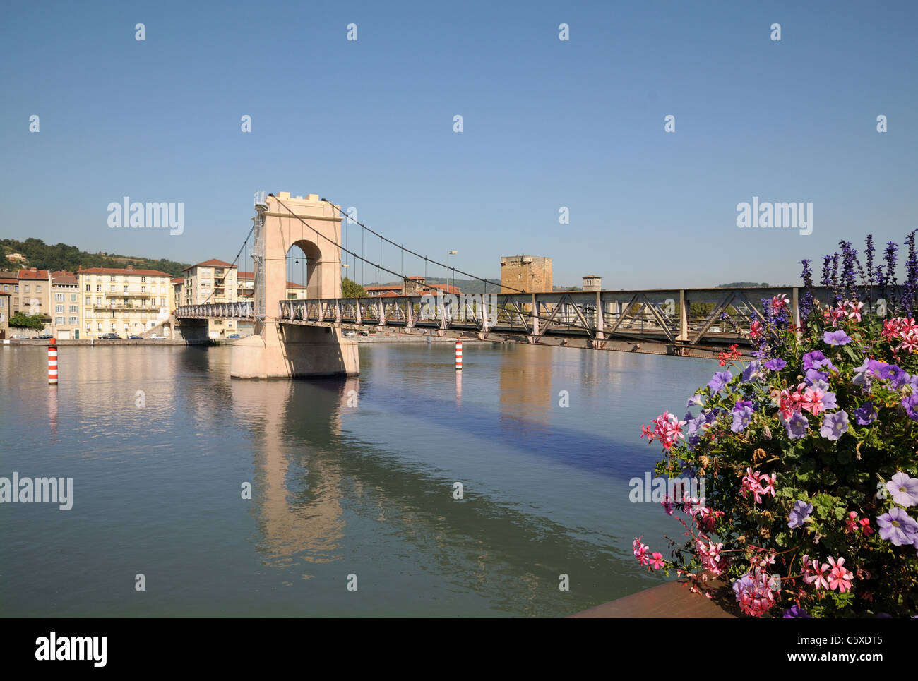 Pedestrian supension bridge “passerelle pietonne” over river Rhone in ...