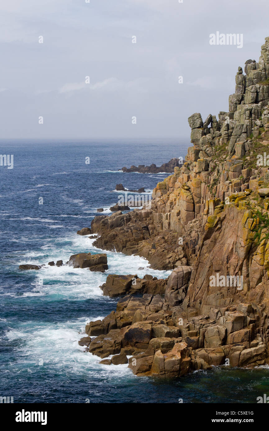 Majestic cliff formation rising out of sea at Lands End, Cornwall Stock ...