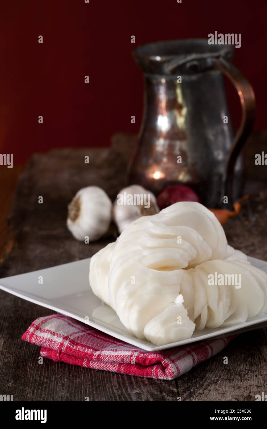 sliced white radish on a plate Stock Photo - Alamy