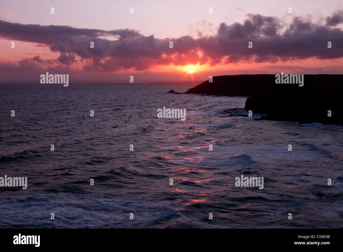 Sunset across Pedngwinian Point, Lizard Peninsula, Cornwall Stock Photo ...