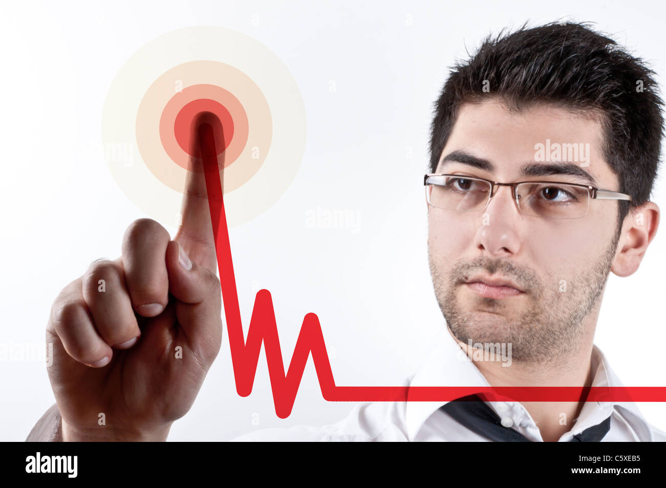 Isolated image of a young business man drawing increasing graphics with ...