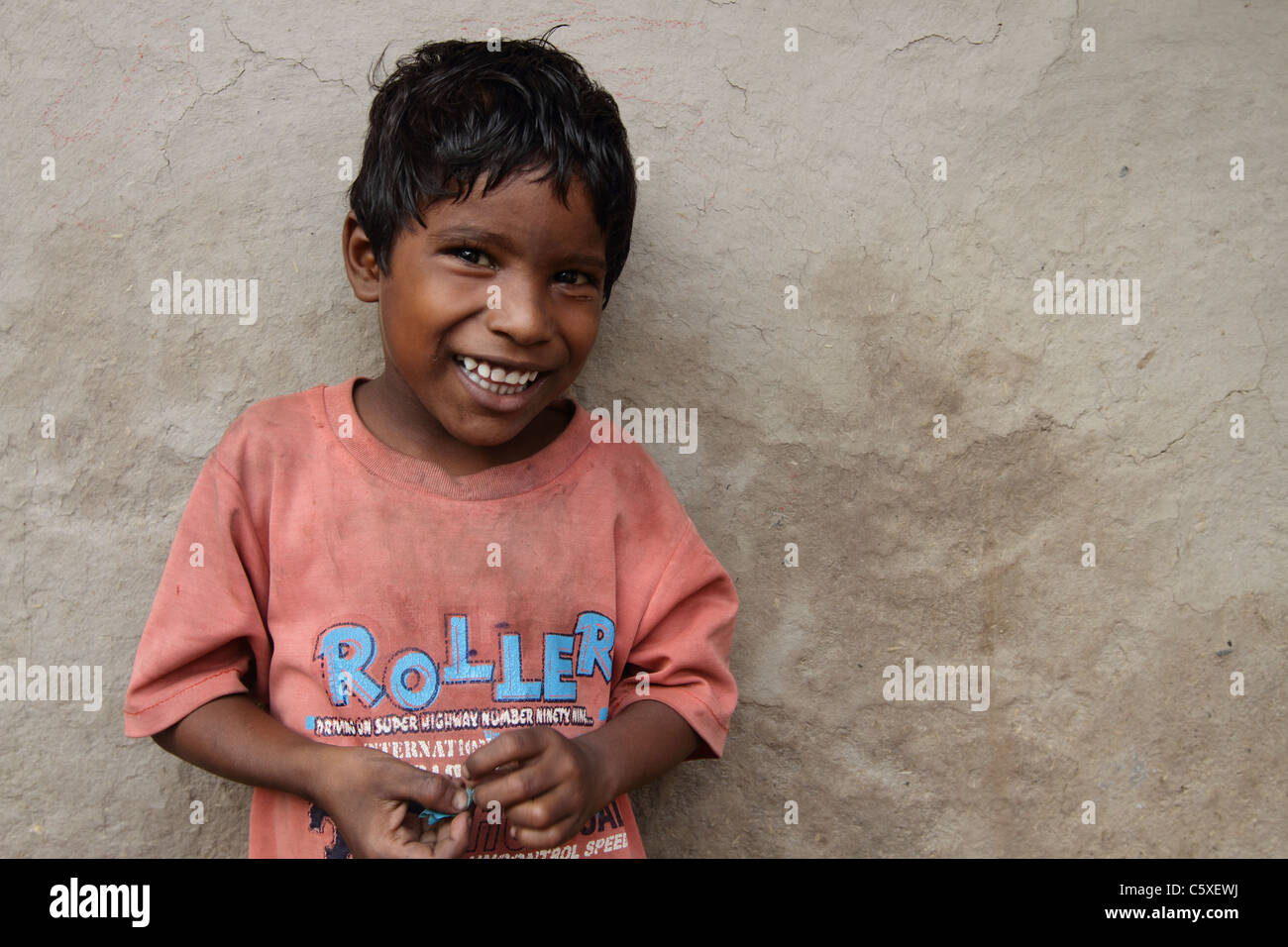 A Indian village boy laughing Stock Photo - Alamy
