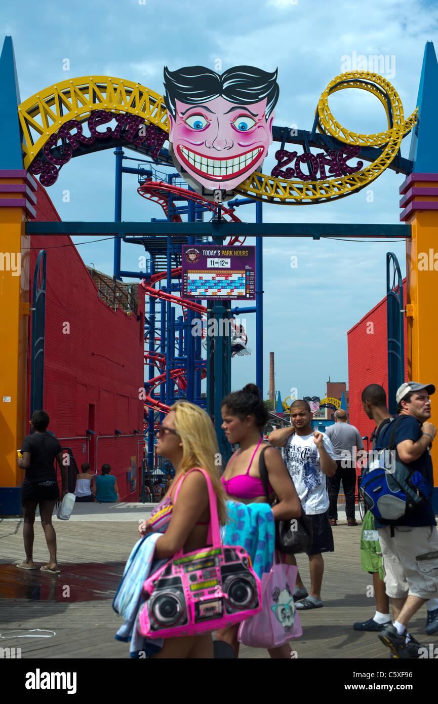 Beachgoers seen passing the new Scream Zone amusement park in Coney ...