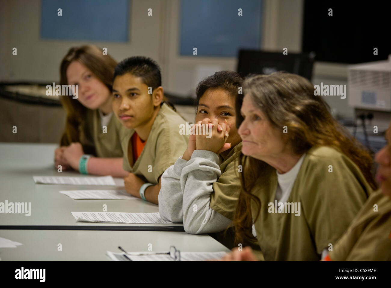 Women in jail group talking hi-res stock photography and images - Alamy