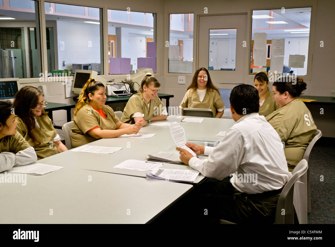 Women in jail group talking hi-res stock photography and images - Alamy