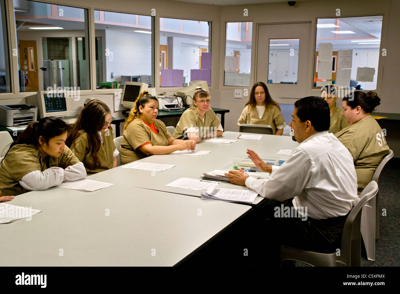 Women in jail group talking hi-res stock photography and images - Alamy