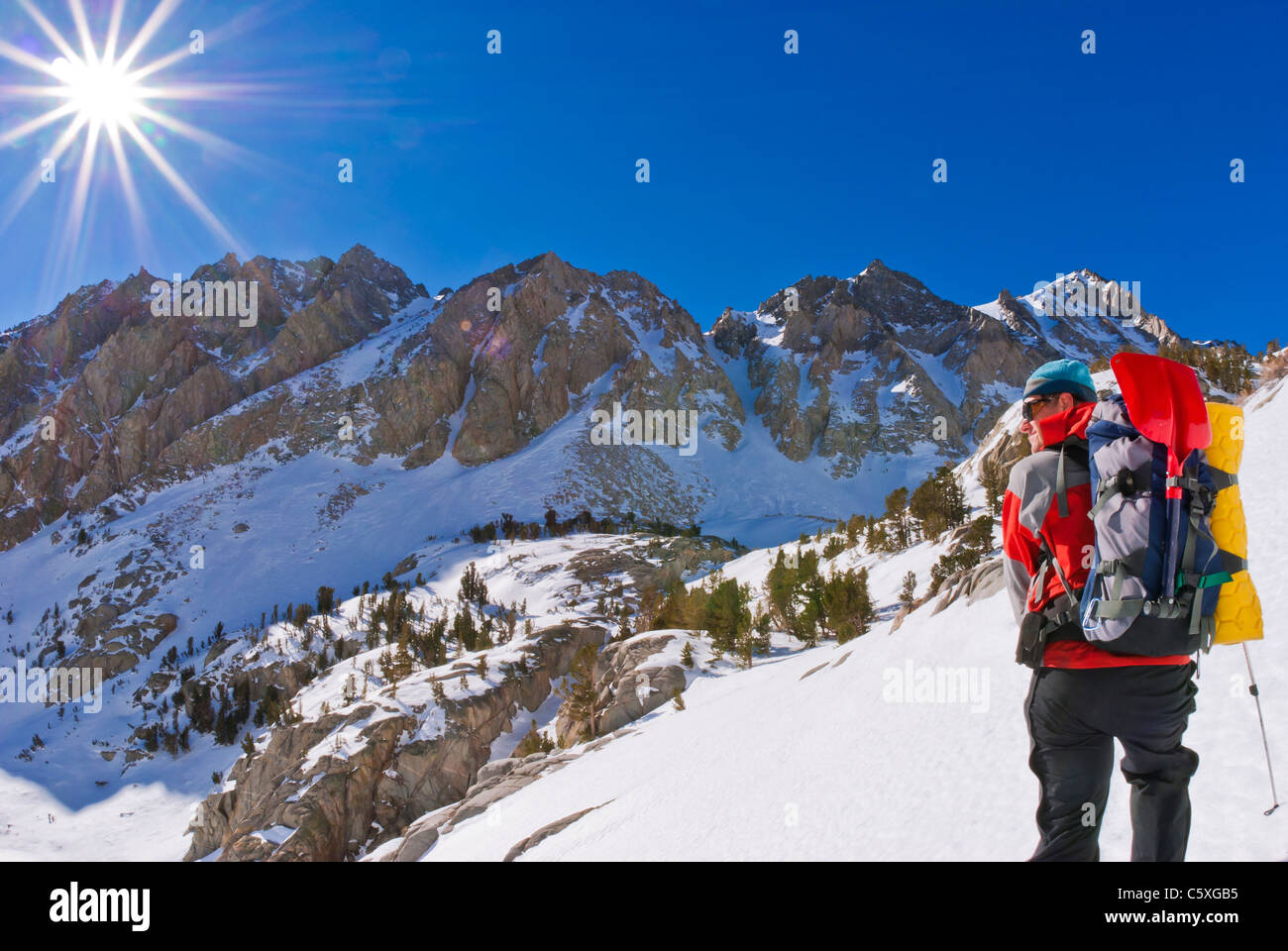 Backcountry skier climbing Piute Pass, Inyo National Forest, Sierra ...