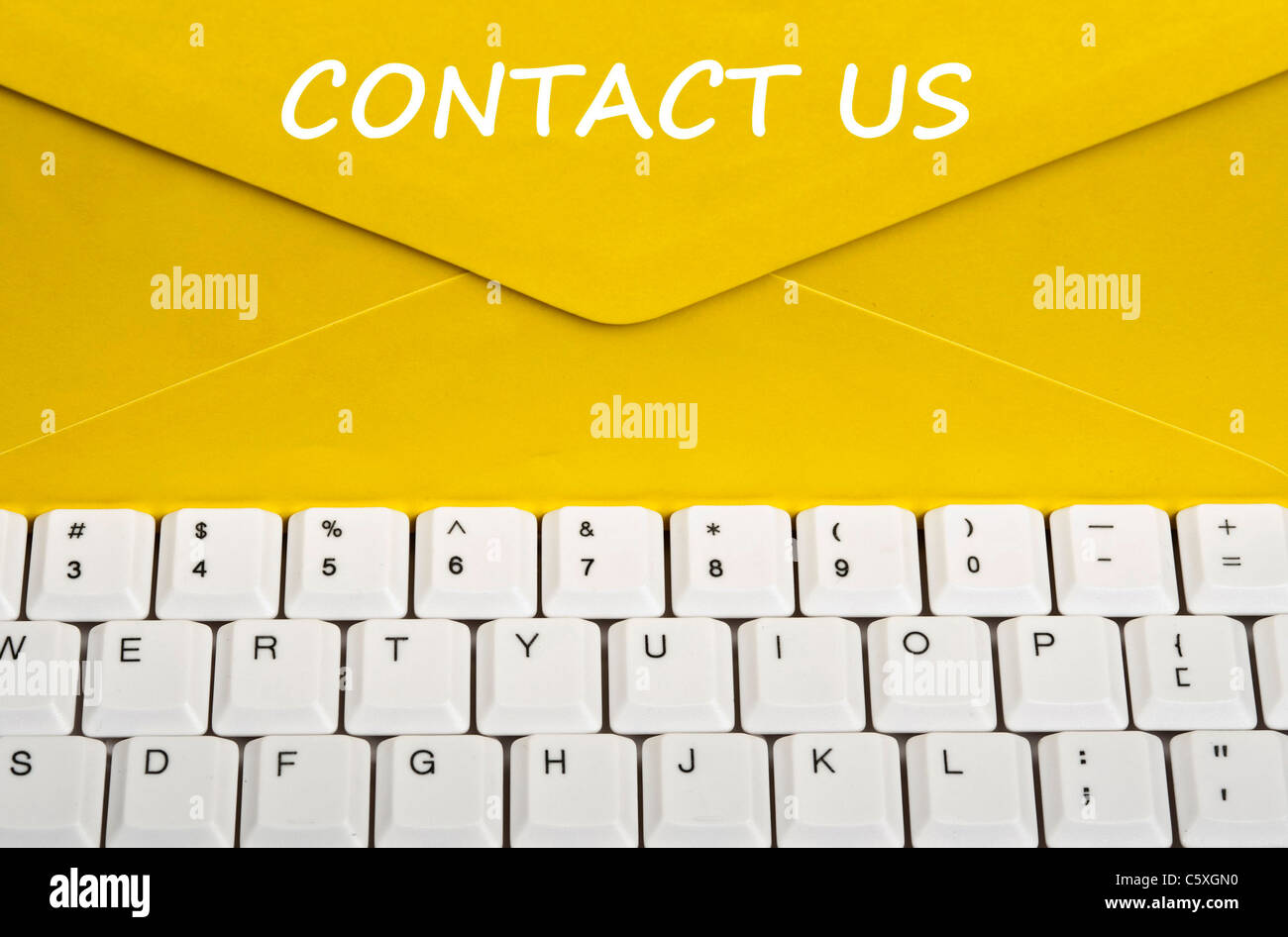Contact us message on envelope Stock Photo - Alamy
