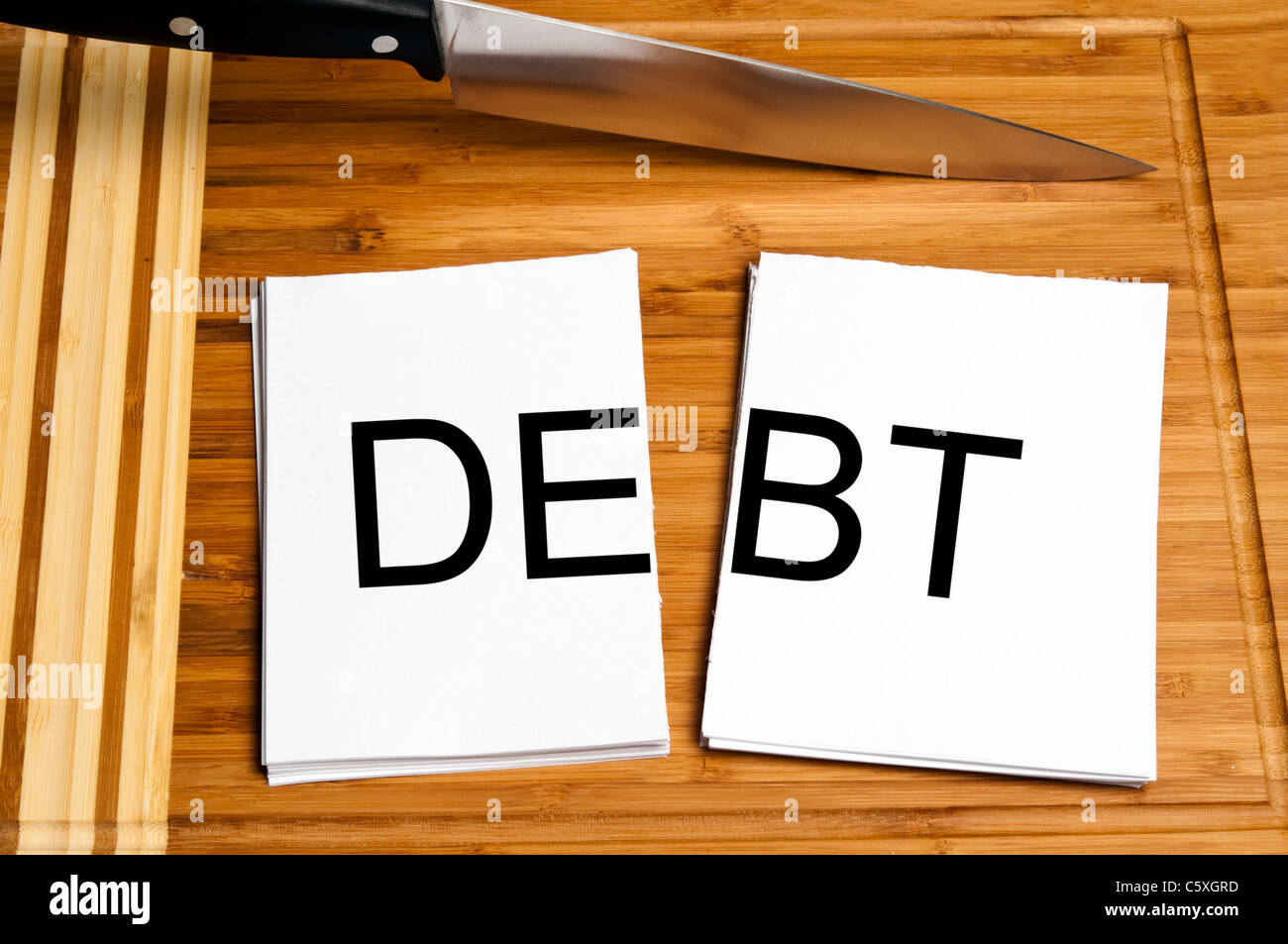 Cut debt hi-res stock photography and images - Alamy
