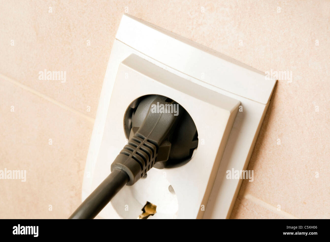 Power outlet extreme close up Stock Photo - Alamy