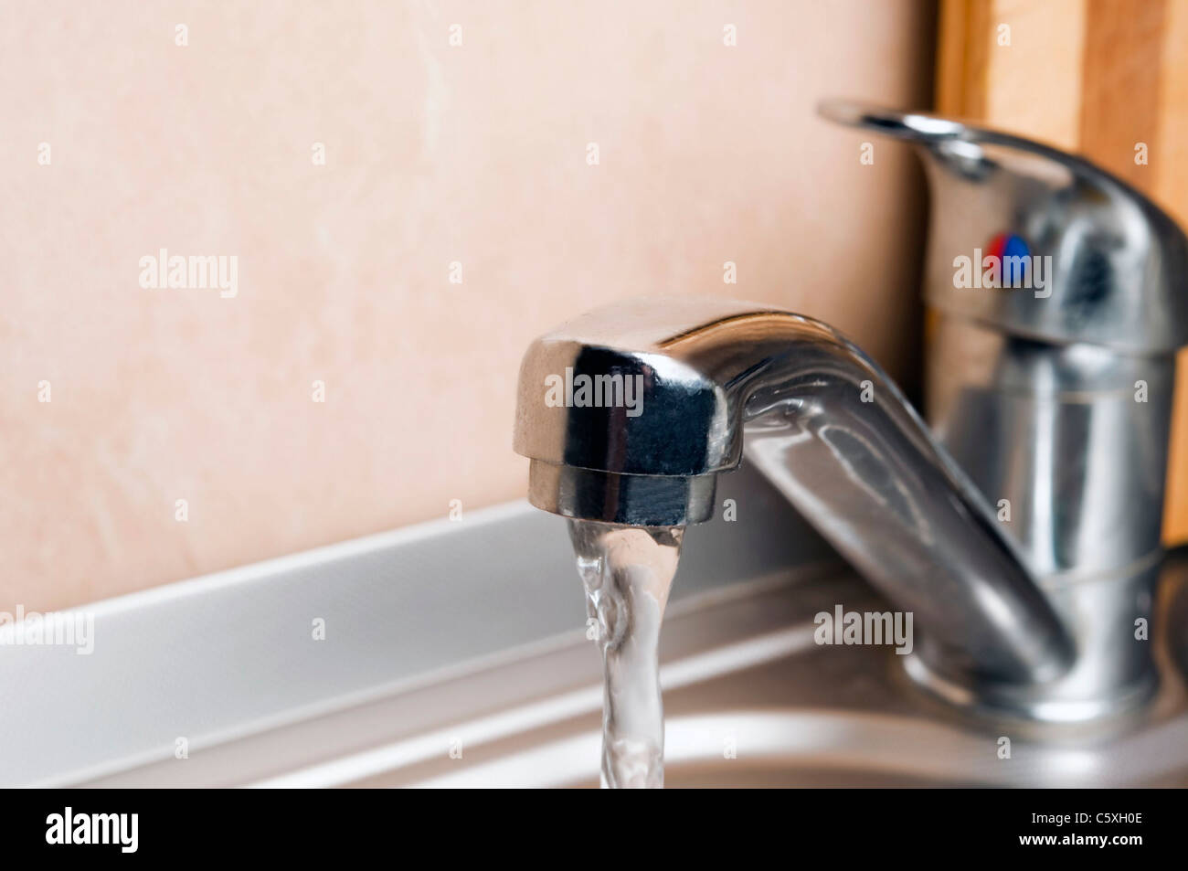 Metal tap water drop close hi-res stock photography and images - Alamy