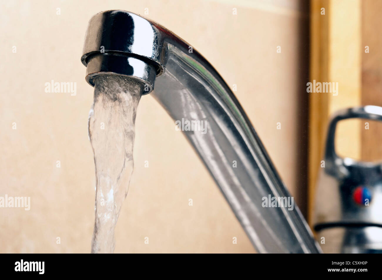 Water drop falling from tap hi-res stock photography and images - Alamy