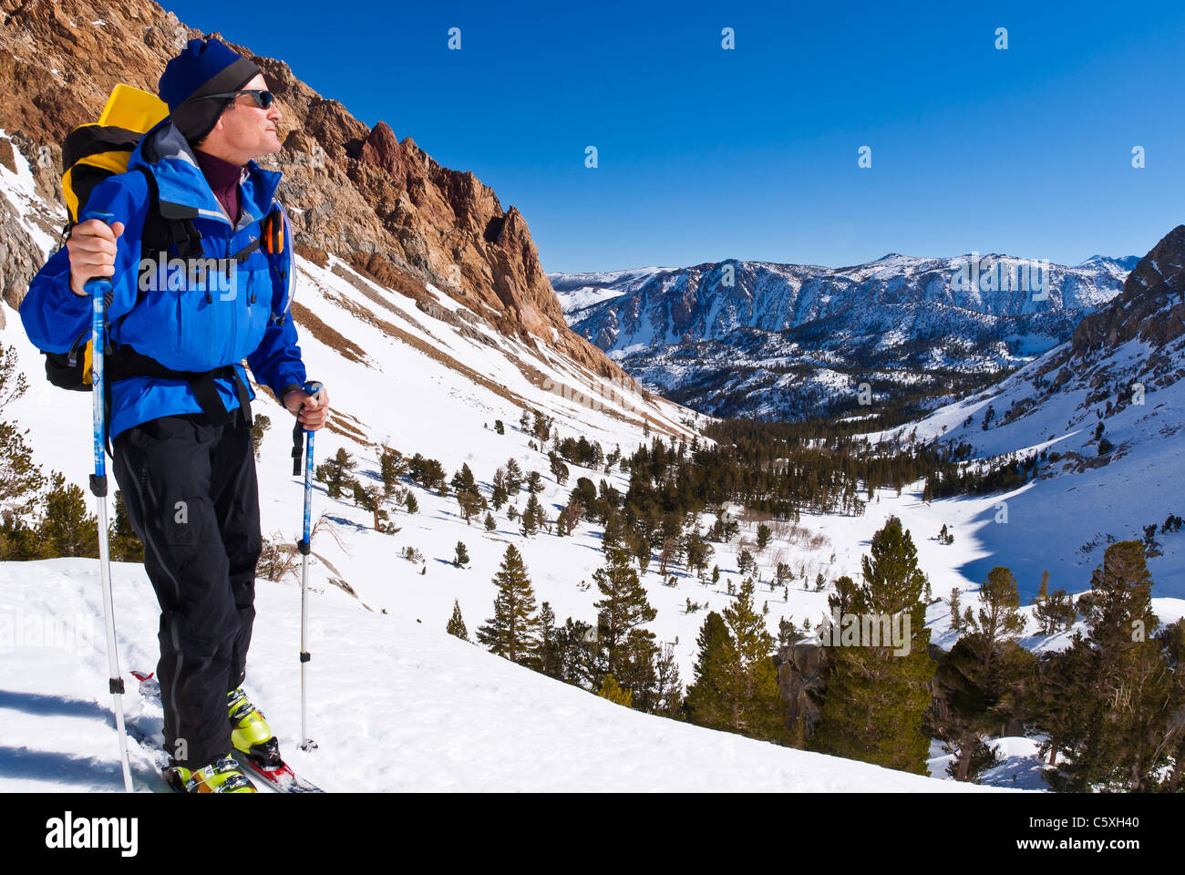 Backcountry skier climbing Piute Pass, Inyo National Forest, Sierra ...