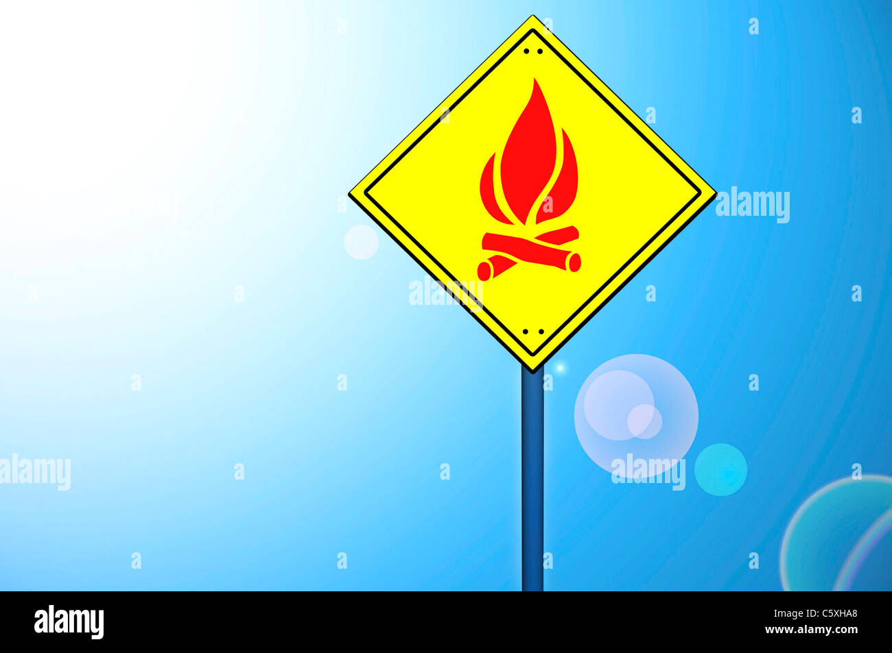 Fire shape on yellow road sign Stock Photo - Alamy