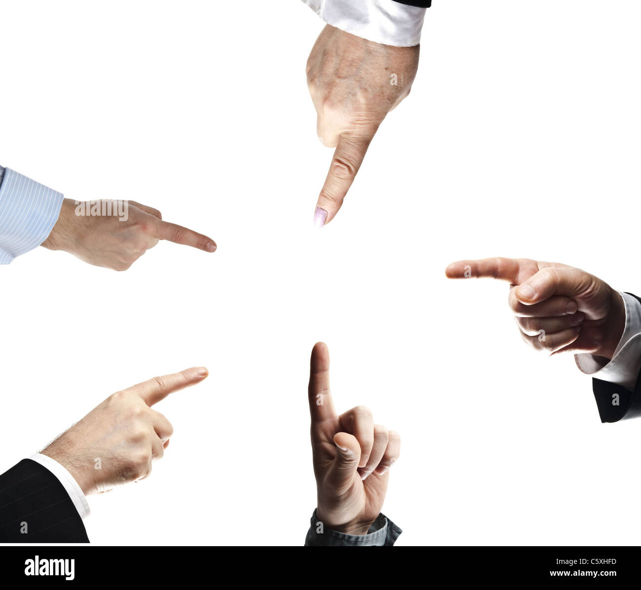 5 business people hands pointing in middle Stock Photo - Alamy