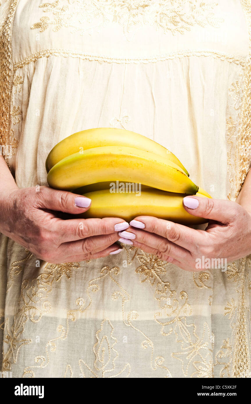 Food in woman hand Stock Photo - Alamy