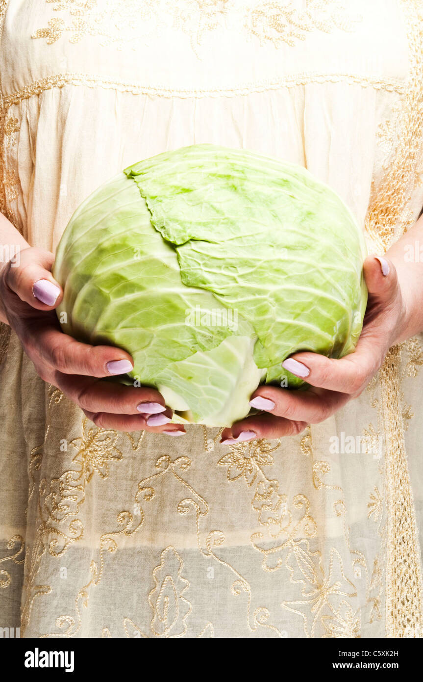 Food in woman hand Stock Photo - Alamy