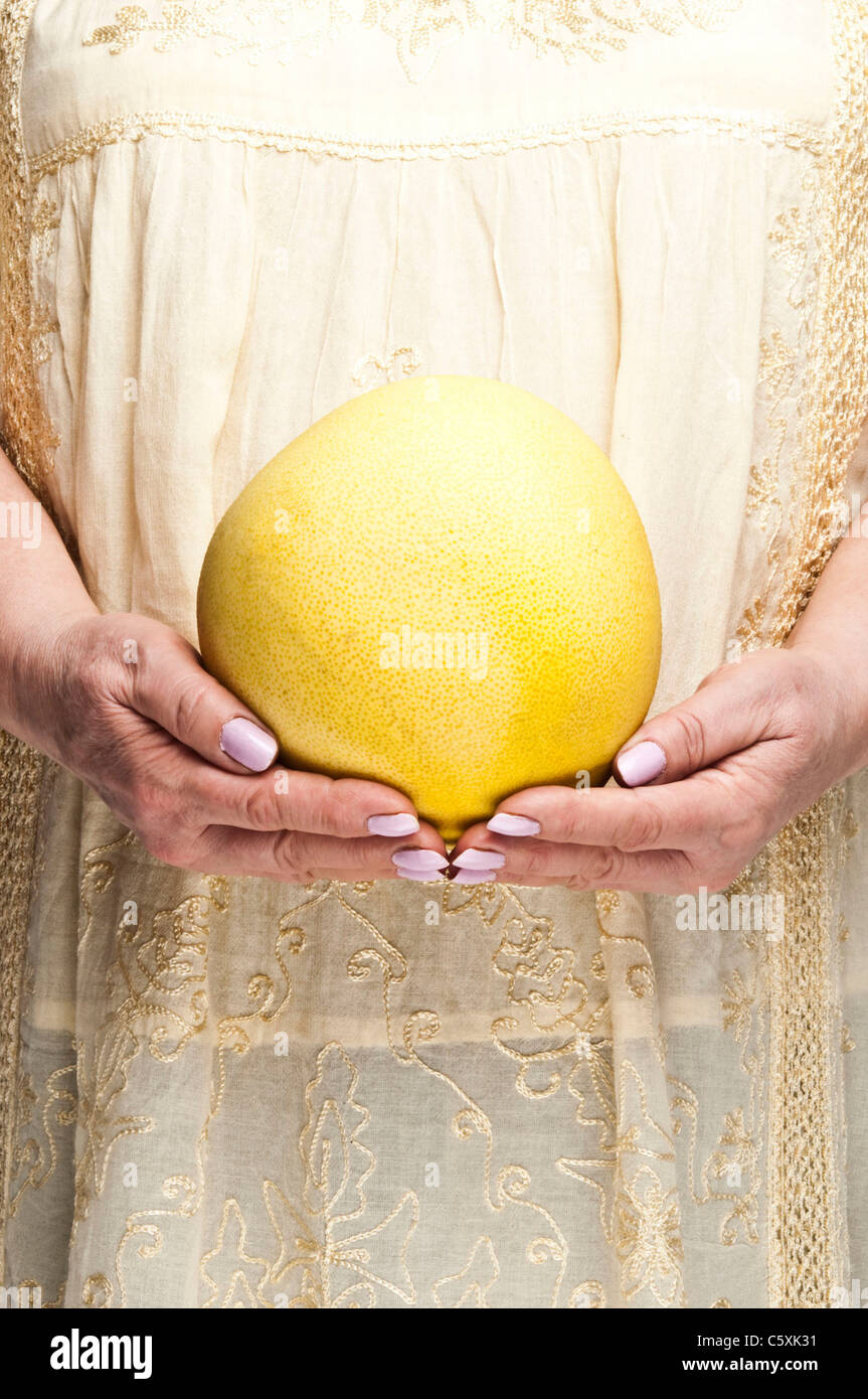 Food in woman hand Stock Photo - Alamy