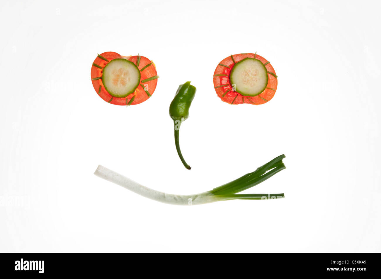Isolated smile face made of vegetables Stock Photo - Alamy