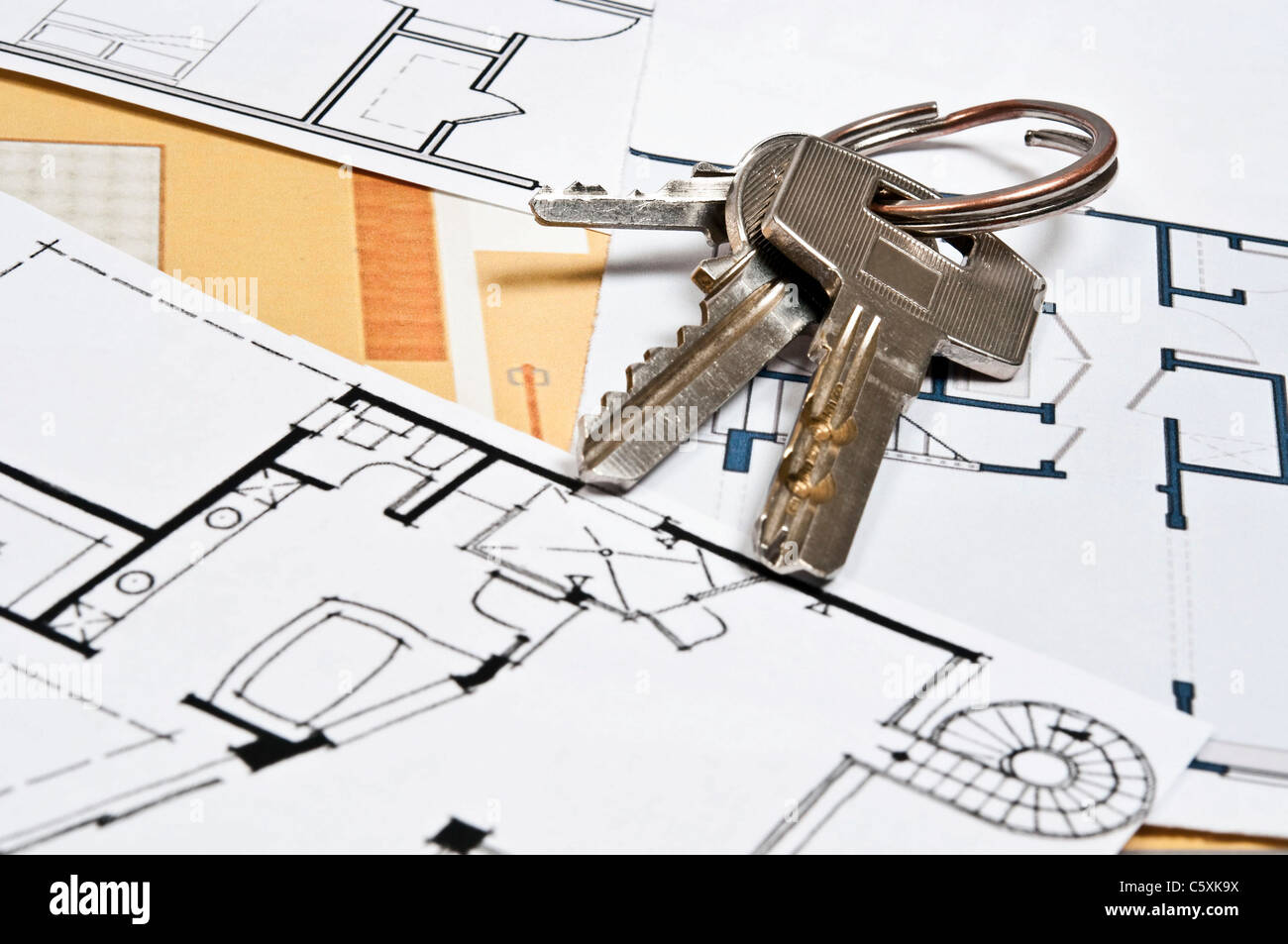 Closeup to key on house plan Stock Photo - Alamy