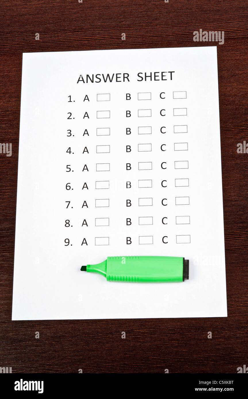 Answer sheet and green marker Stock Photo - Alamy