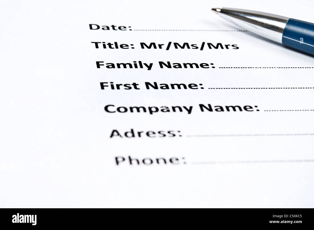 Identification form and a pen Stock Photo - Alamy