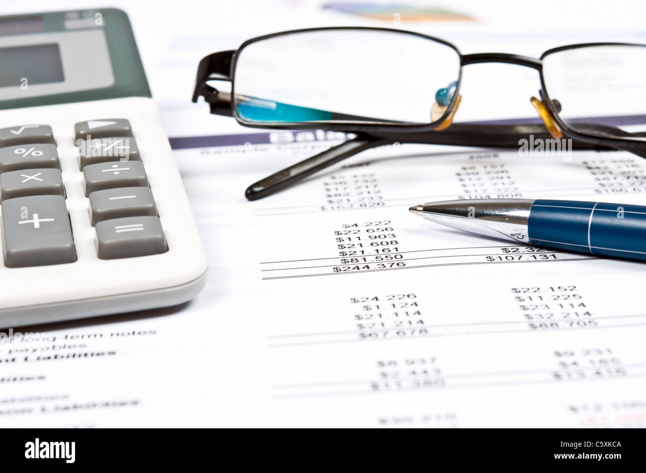 Financial paper and office tools Stock Photo - Alamy