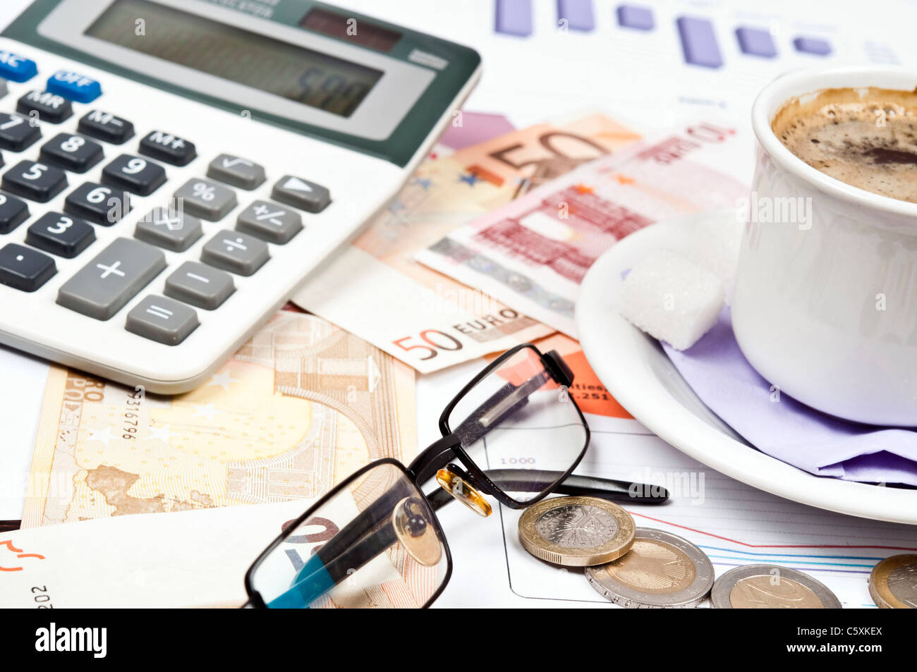 Financial paper and office tools Stock Photo - Alamy