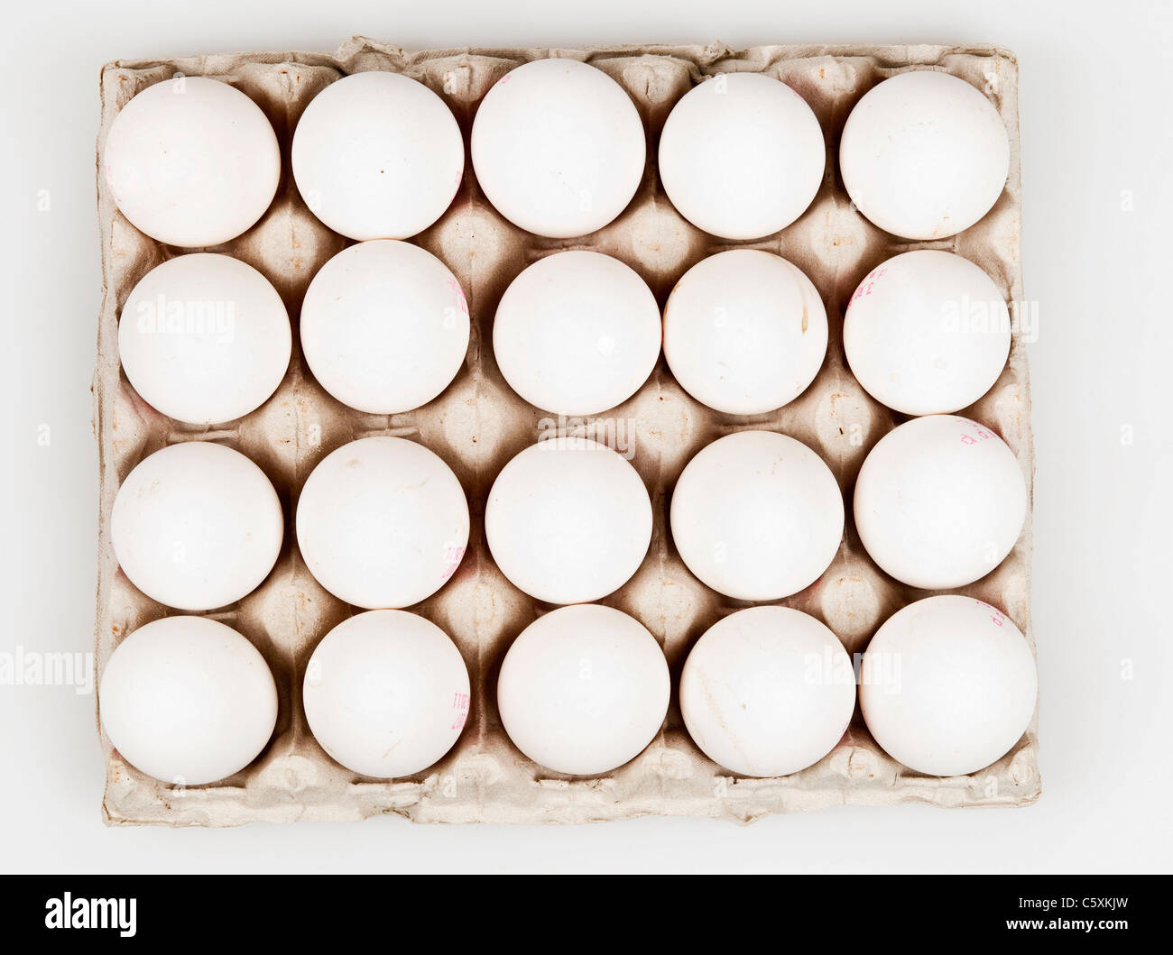 isolated full egg carton on white Stock Photo - Alamy