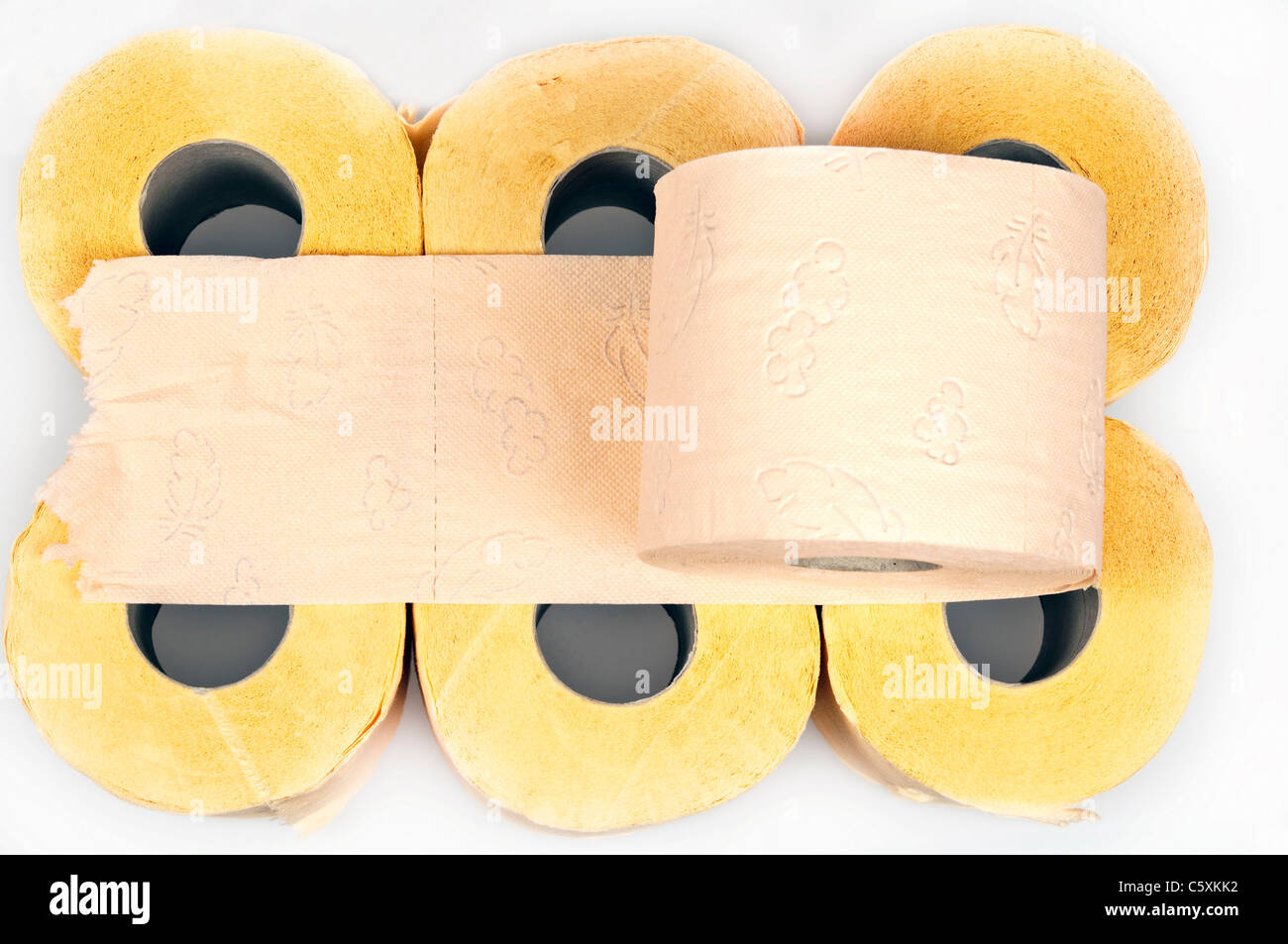 Many toilet paper on white Stock Photo - Alamy