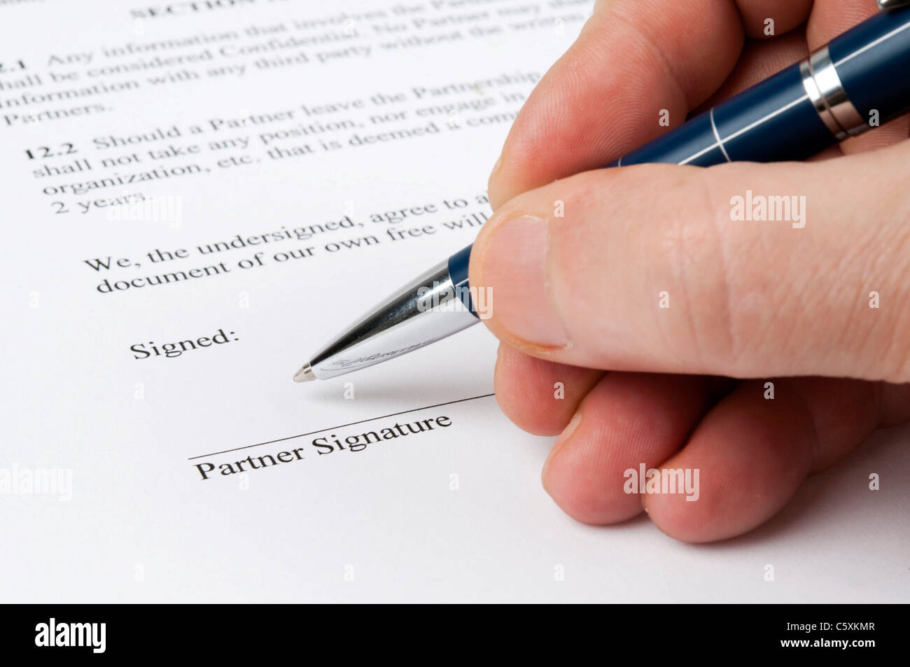 Close-up to contract on signature Stock Photo - Alamy