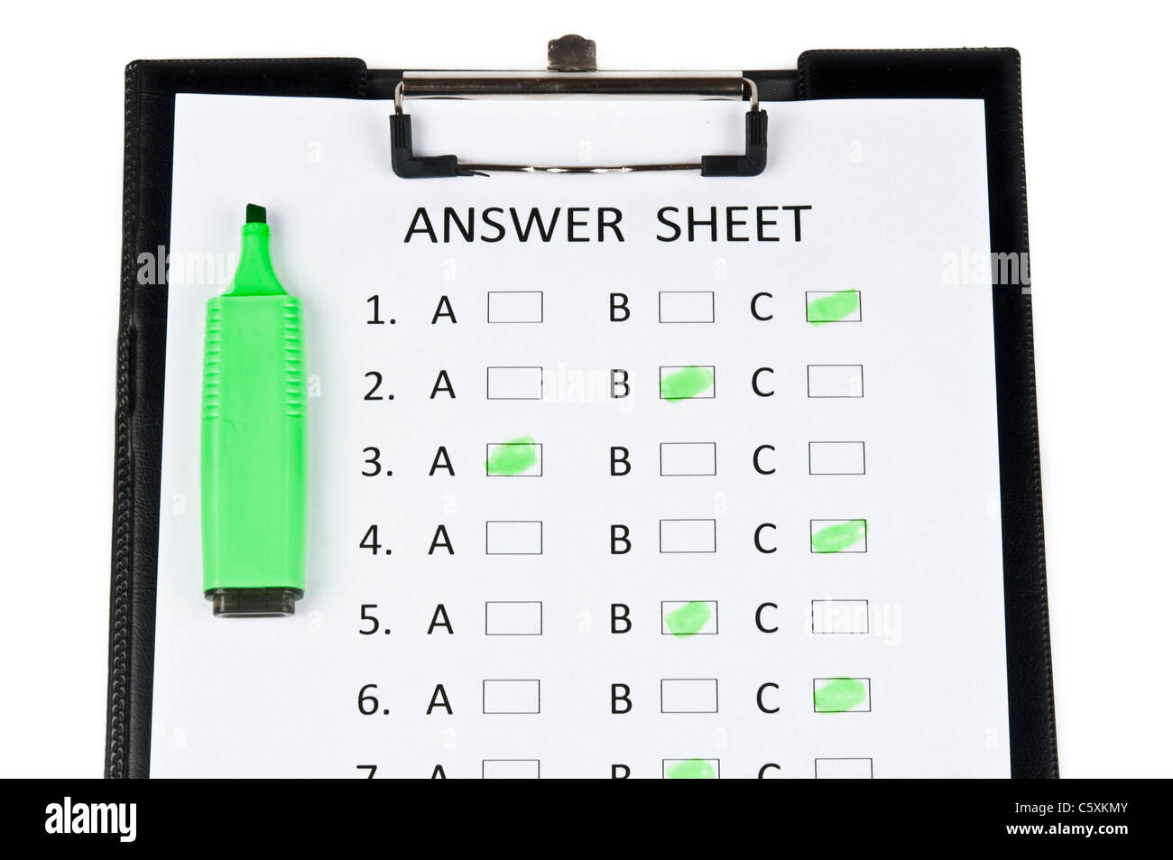 Answer sheet and green marker Stock Photo - Alamy