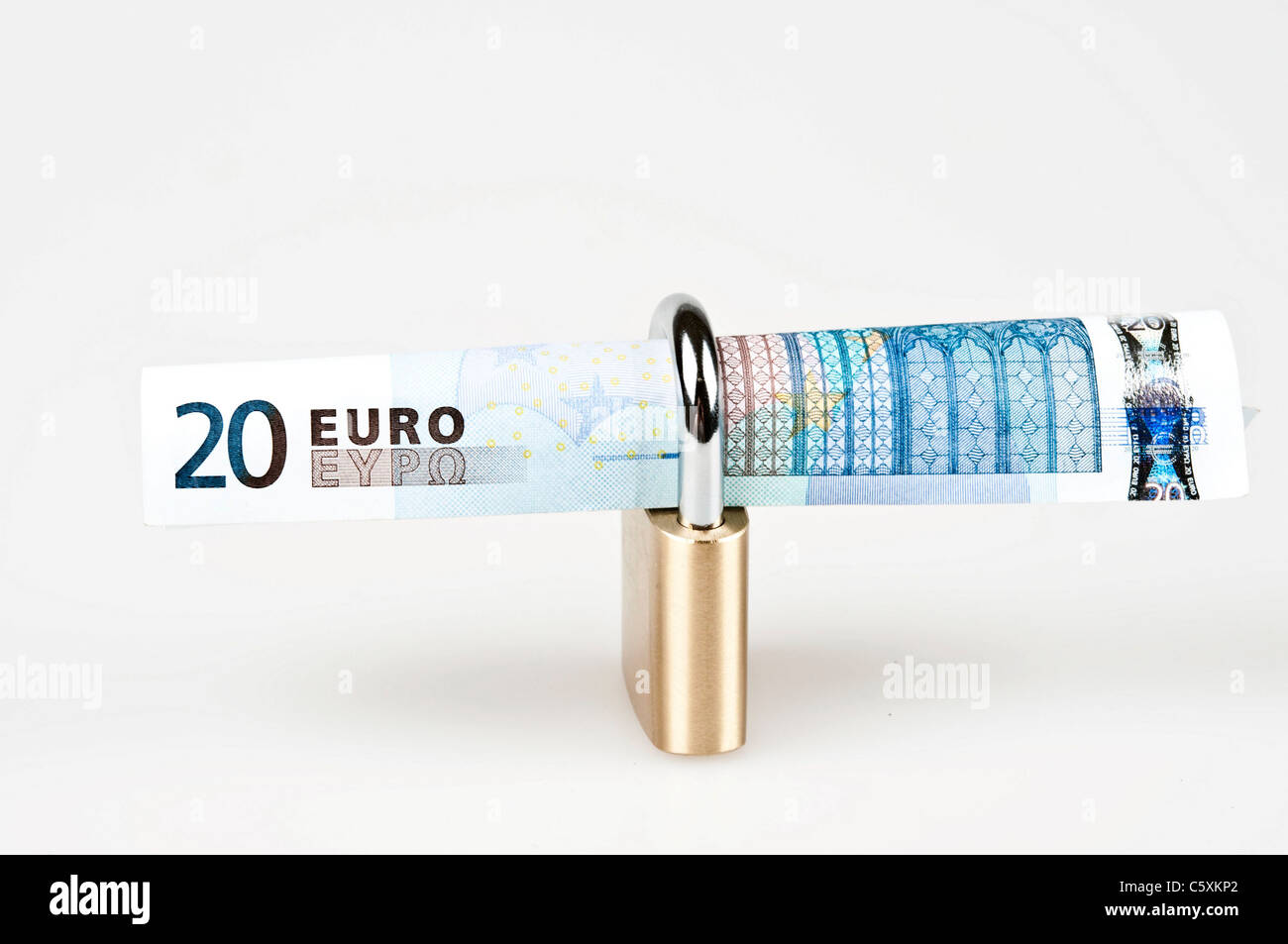 Euro banknotes in closed padlock Stock Photo - Alamy